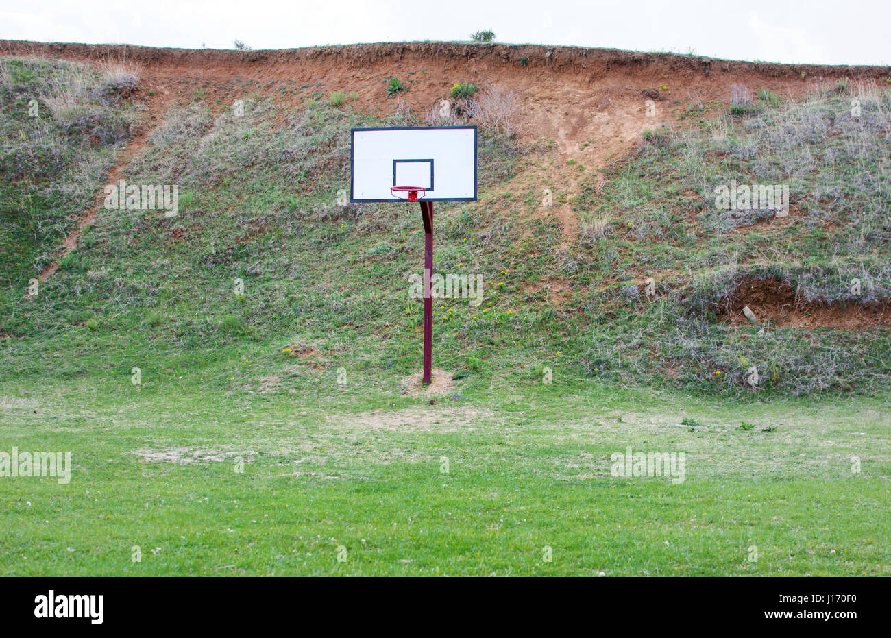 Basketball field covered grass hi-res stock photography and images - Alamy