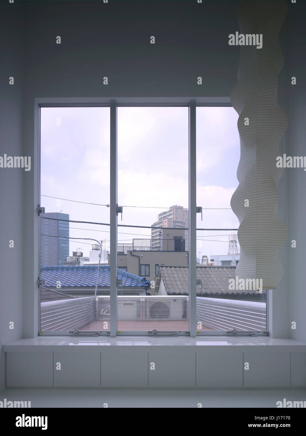 Window view towards city from upper floor. Townhouse in Tokyo, Tokyo ...