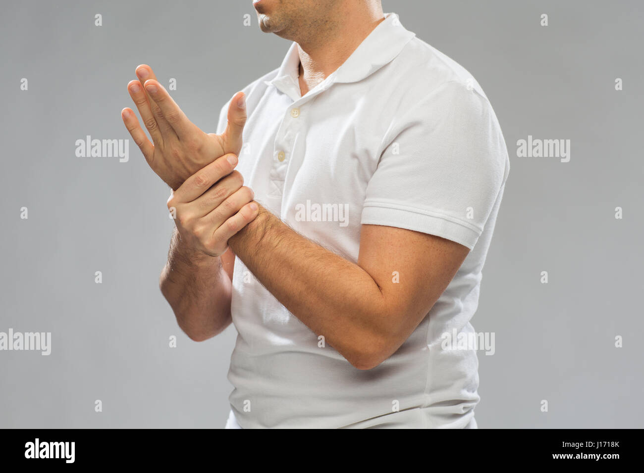 close up of man suffering from pain in hand Stock Photo - Alamy