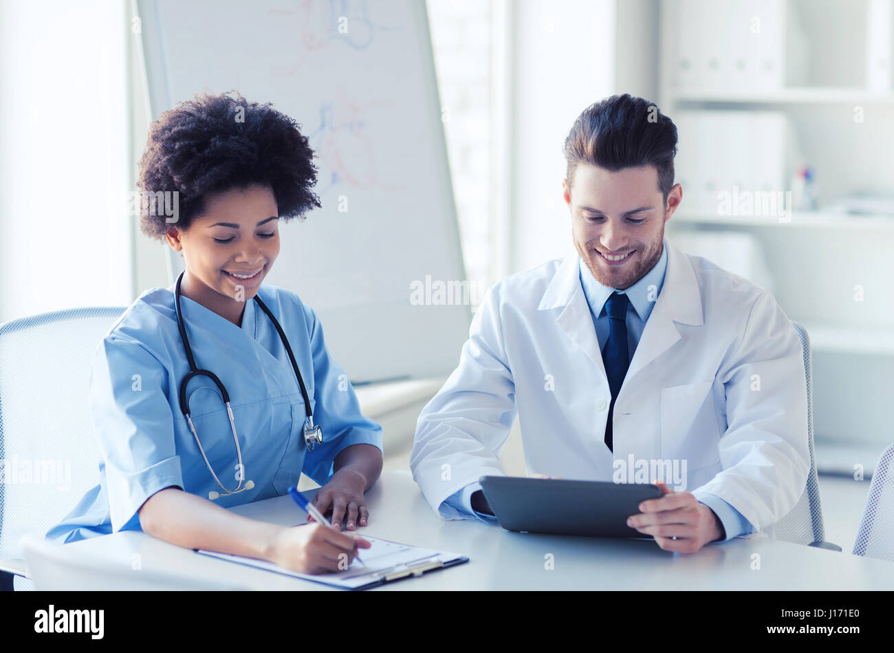 two happy doctors meeting at hospital office Stock Photo - Alamy