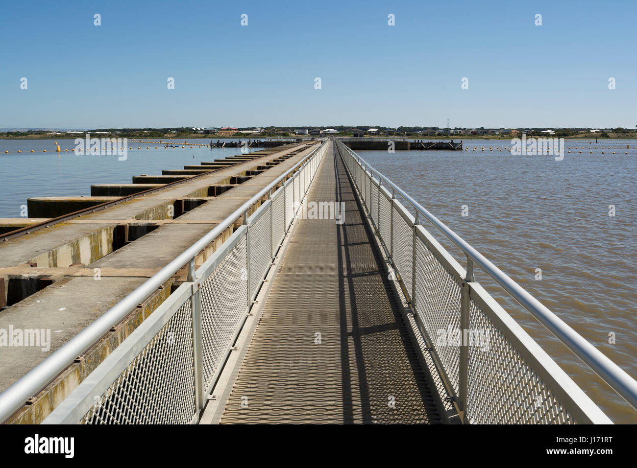Down the walk way of the barrage and lock at Goolwa, South Australia ...