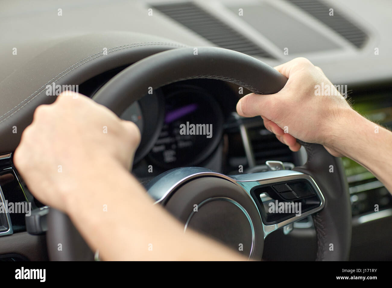 close up of male hands driving car Stock Photo - Alamy