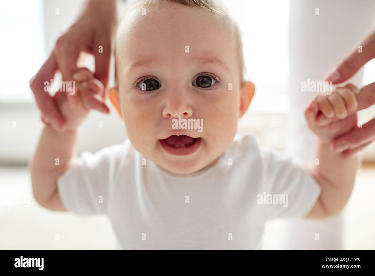 Baby toddling learning walk hi-res stock photography and images - Alamy
