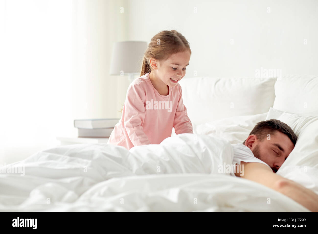 Hispanic child waking up morning hi-res stock photography and images ...