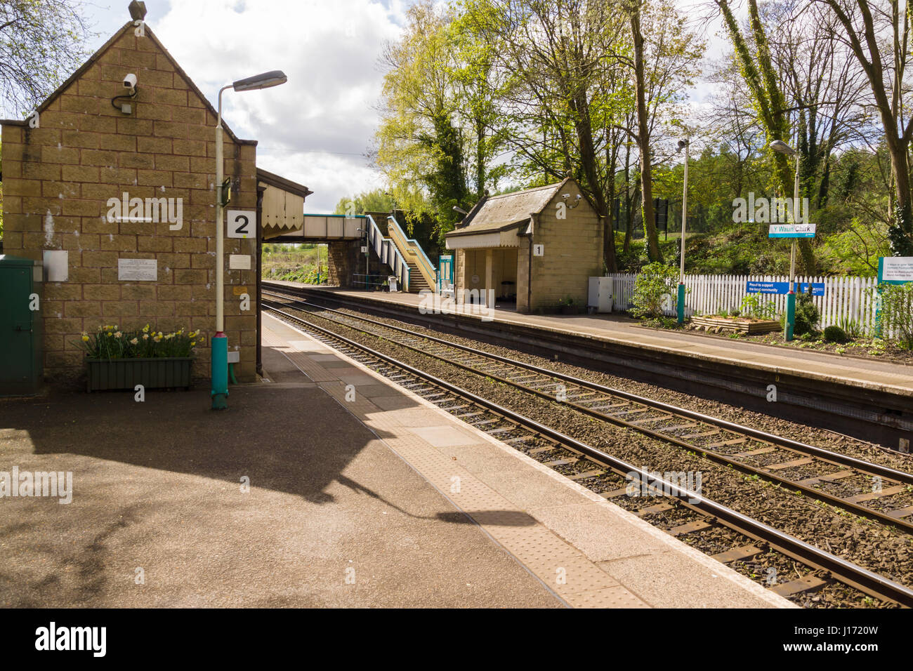 Chirk rural railway station tracks and platform on the main line ...