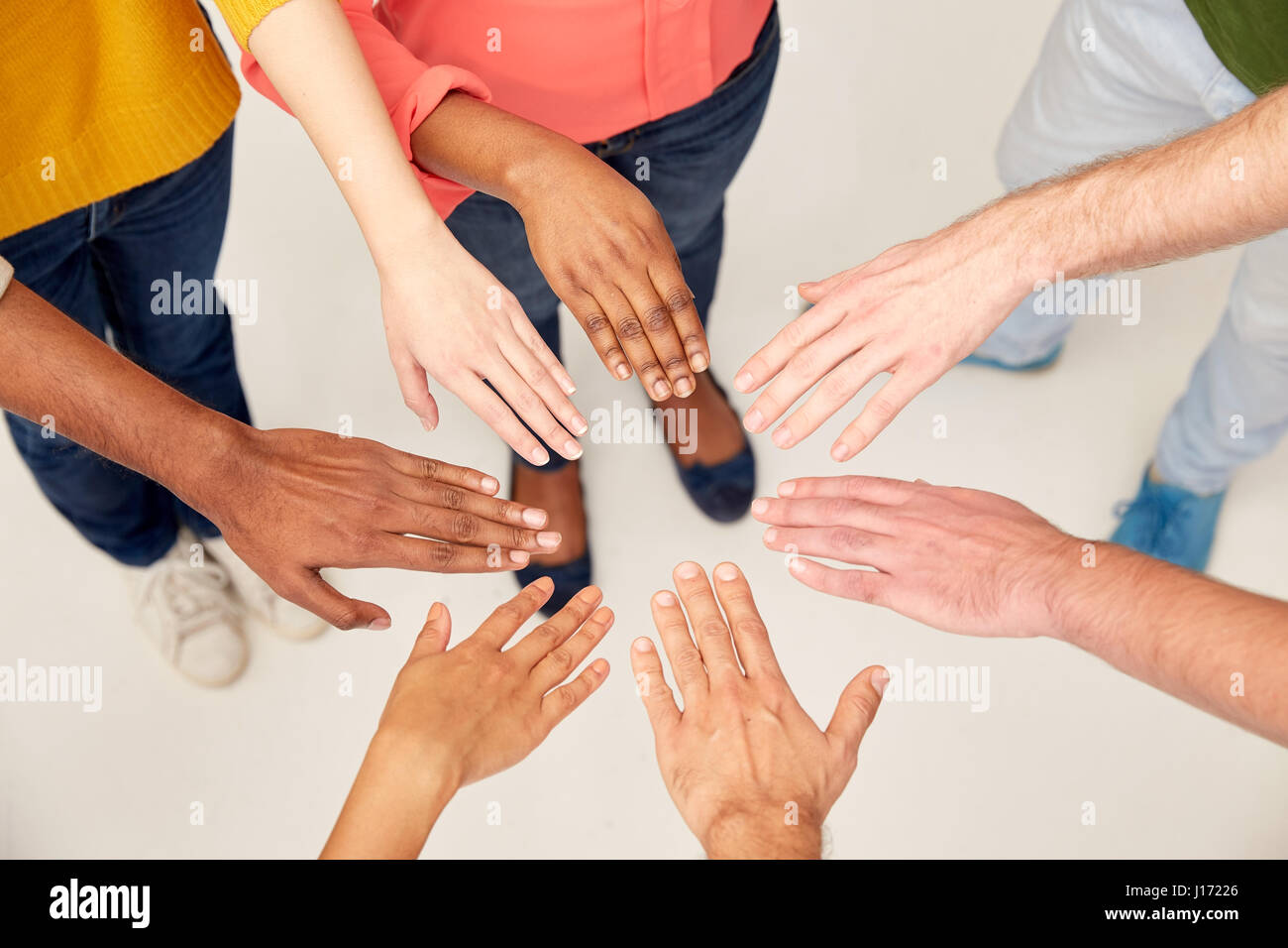 group of international people hands Stock Photo - Alamy