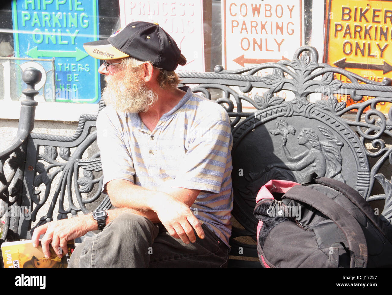 Homeless man smoking cigarette hi-res stock photography and images - Alamy