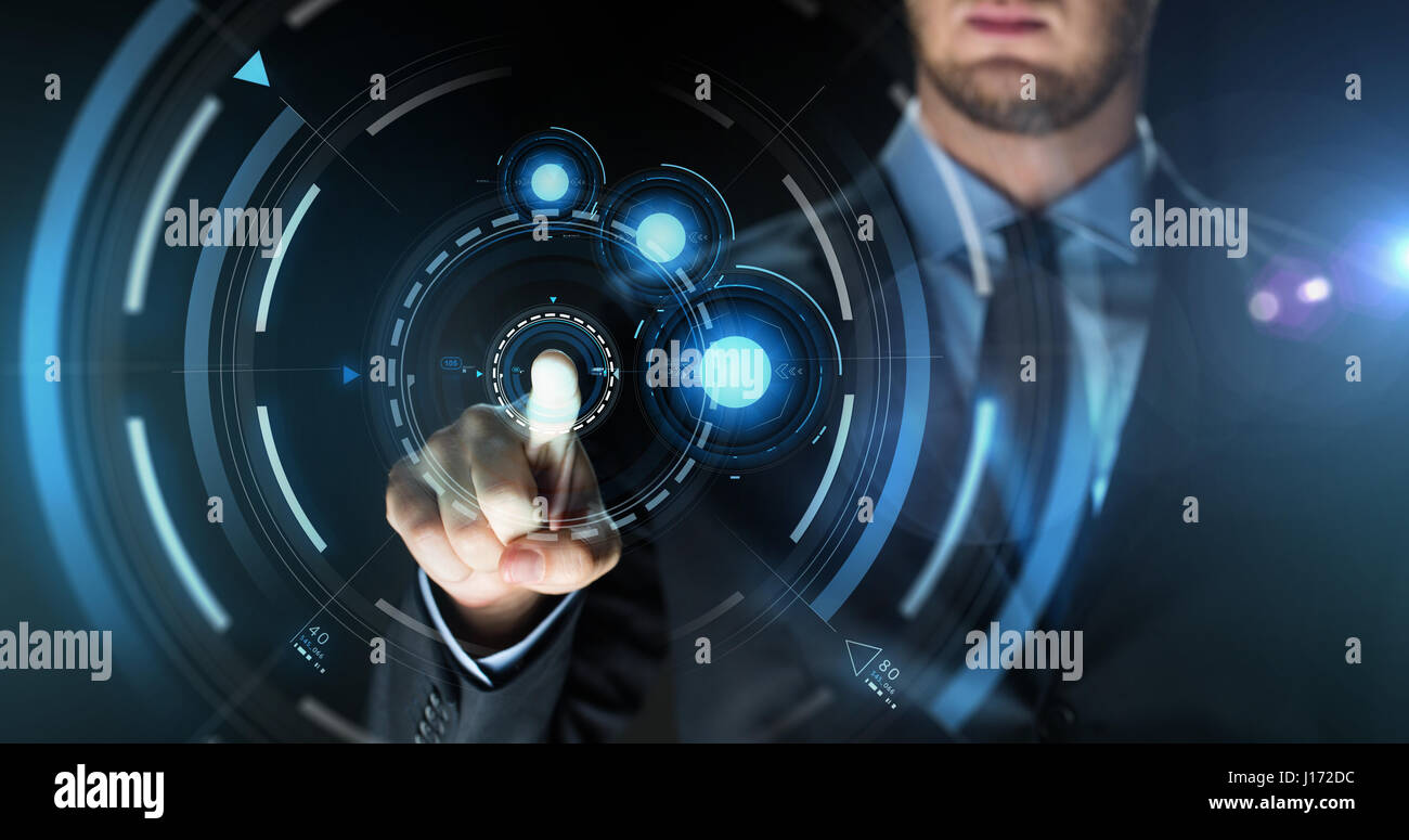businessman touching virtual screen projection Stock Photo - Alamy