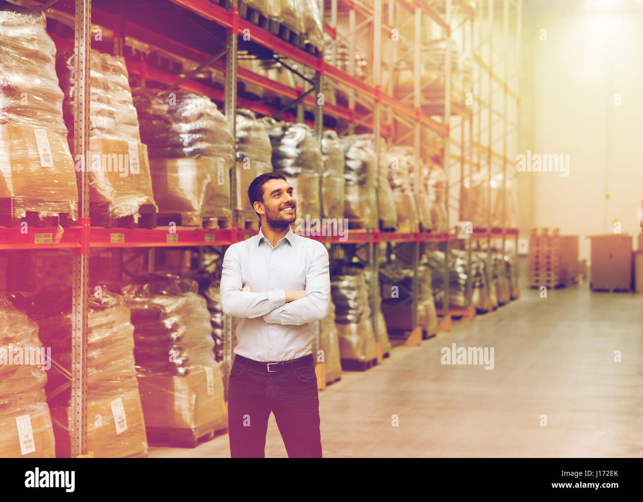 happy man at warehouse Stock Photo - Alamy