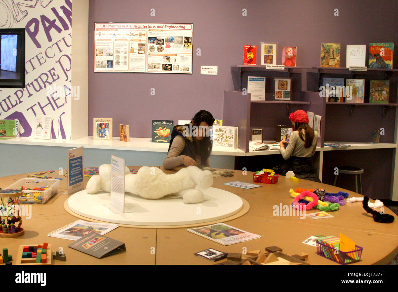 Mother and child involve in activities in children's space in Art ...