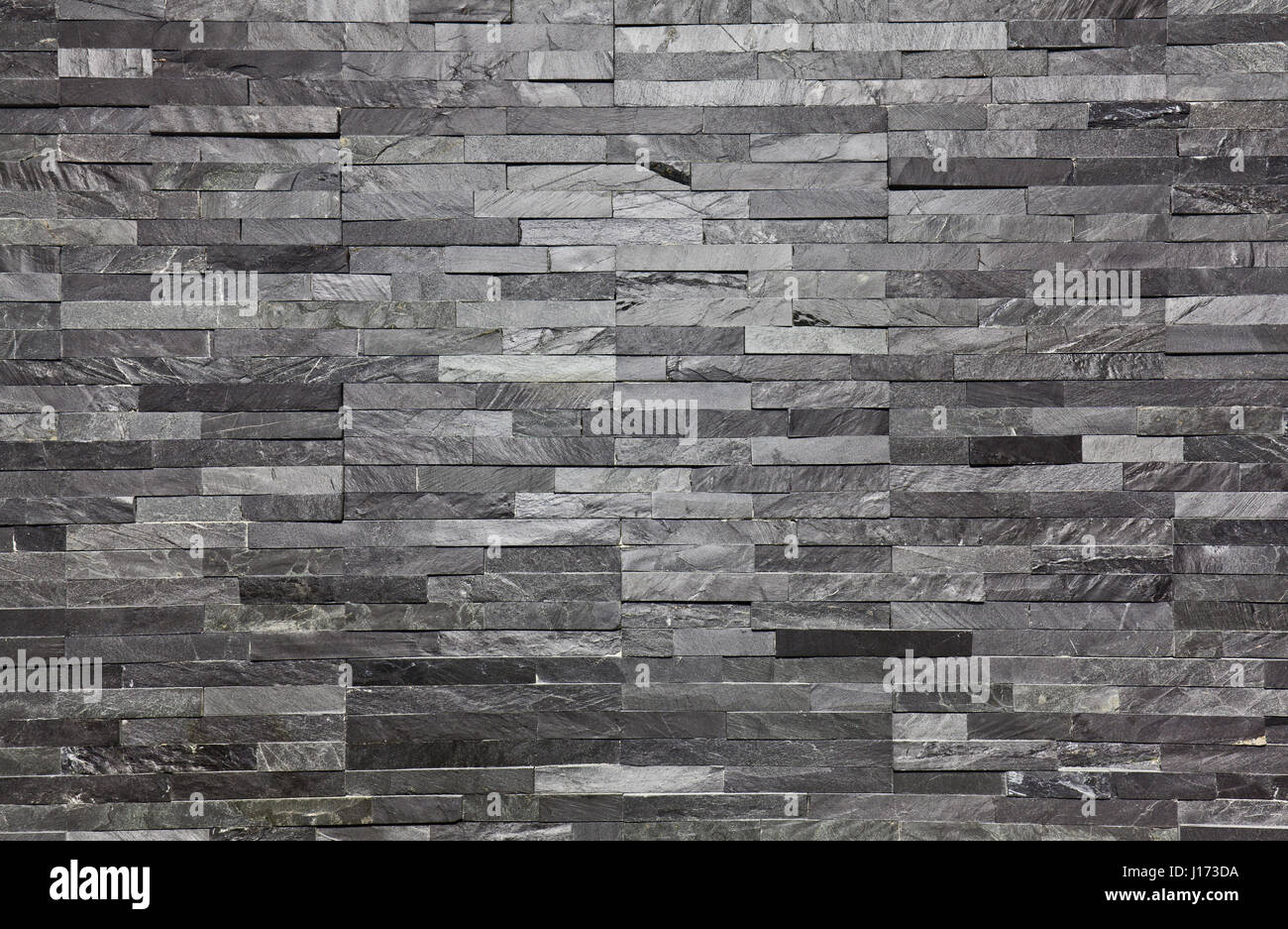 real slate brick interior wall background Stock Photo - Alamy