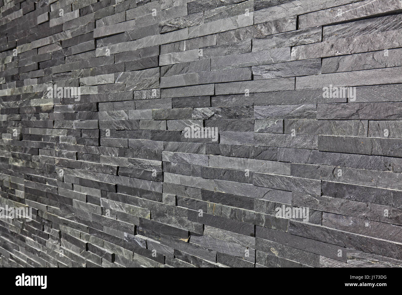 real slate brick interior wall background Stock Photo - Alamy