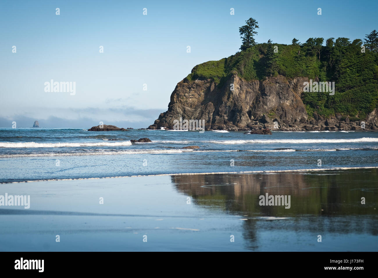 rocks and waves in quiet beach of Ruby Beach of Olympic National Park ...