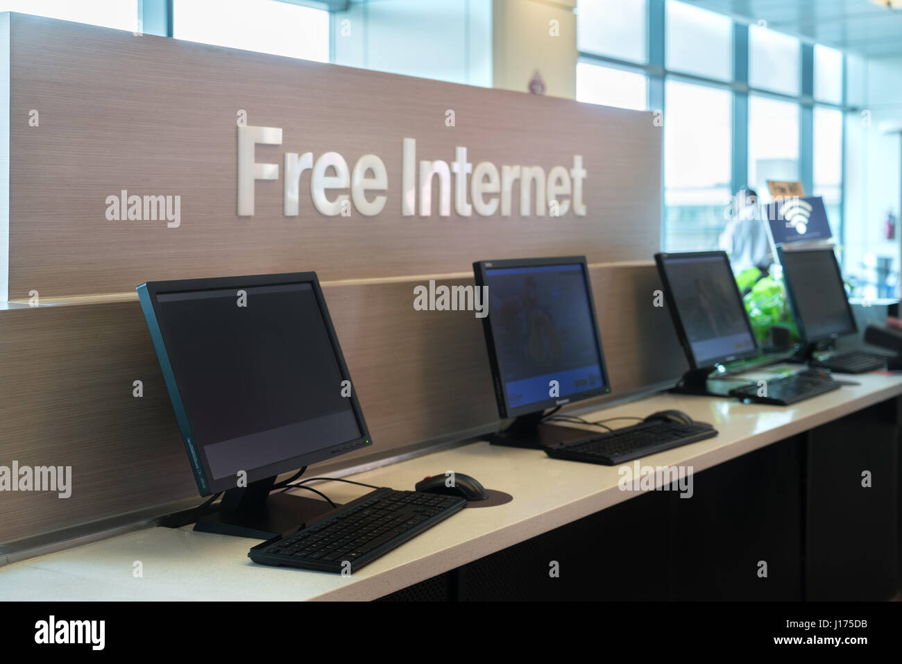 Free internet point at airport terminal. Smart airport Stock Photo - Alamy