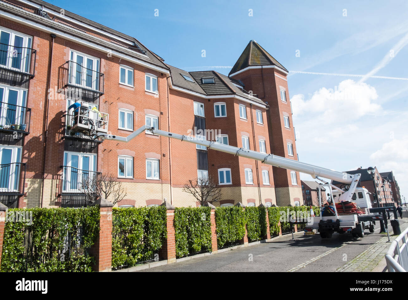Window,cleaning,from,crane,vehicle,apartment,South Ferry Quay,docks ...