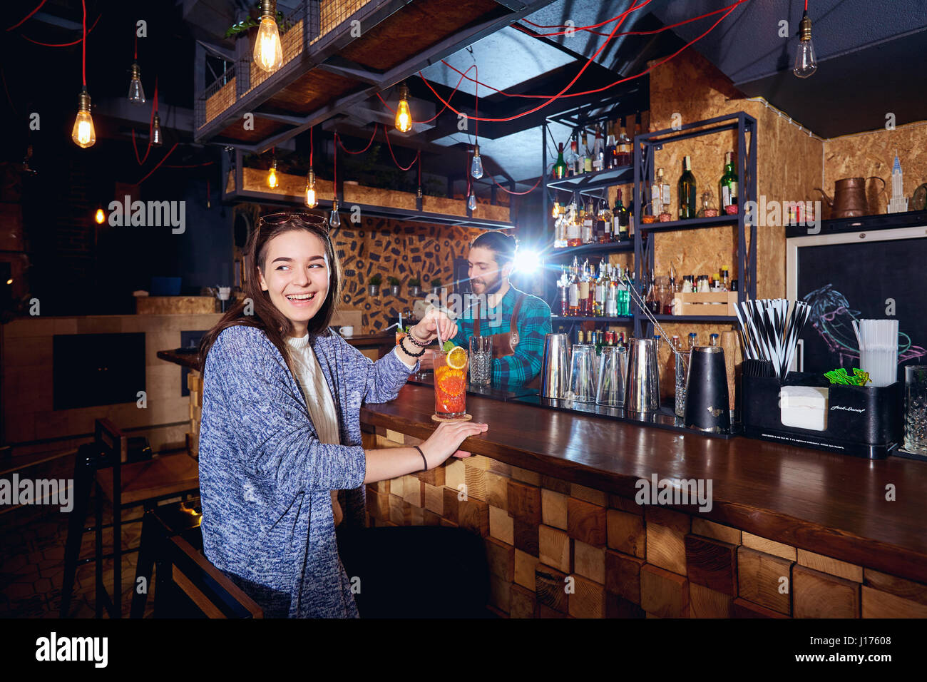 Woman drinking at a bar woman drinking at a bar hi-res stock ...