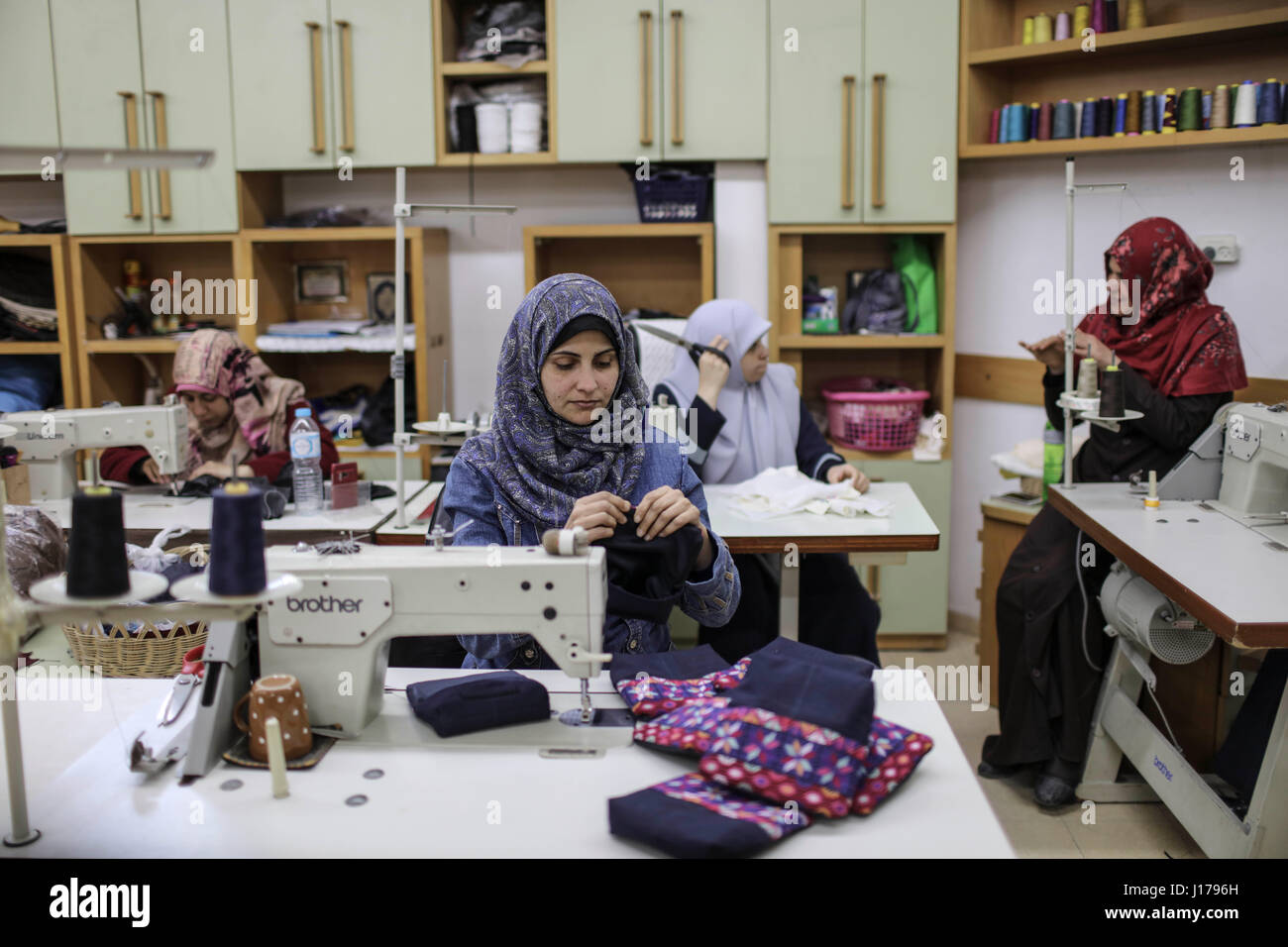 Gaza. 18th Apr, 2017. Palestinian deaf women work on embroidery at ...
