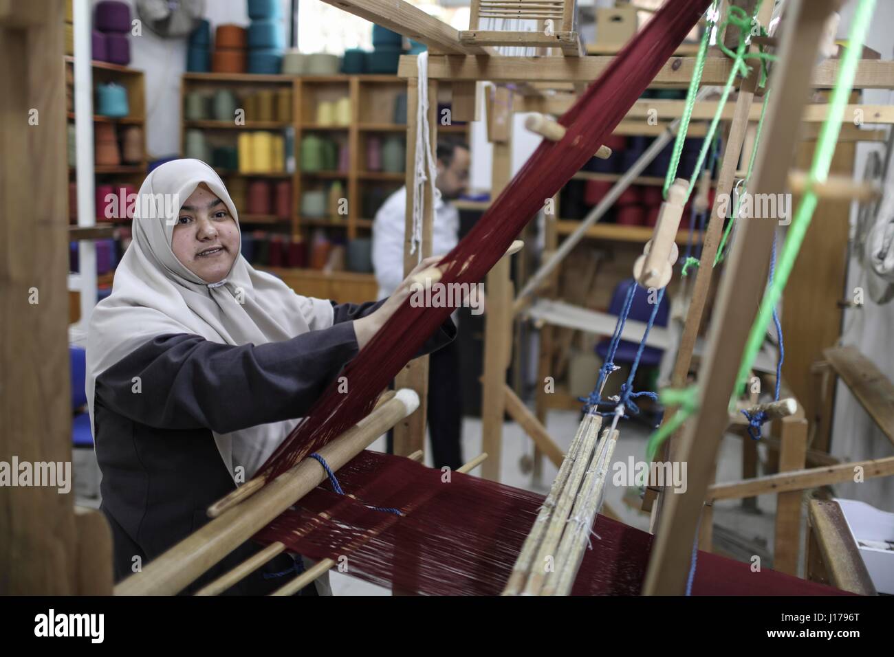 Gaza. 18th Apr, 2017. A Palestinian deaf woman works on embroidery at ...
