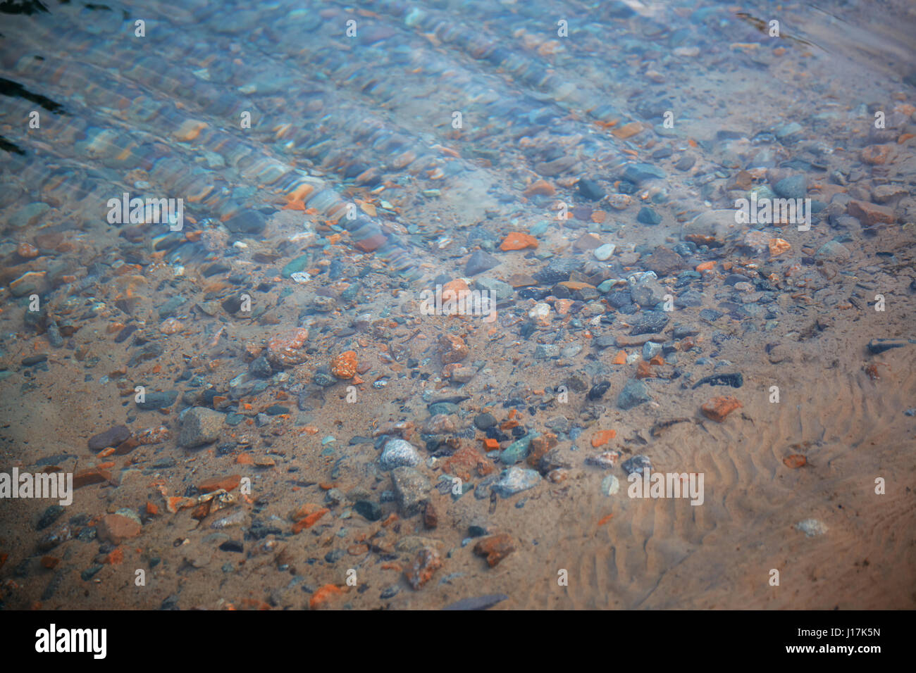 Underwater pebbles in the river. Close-up photo Stock Photo - Alamy