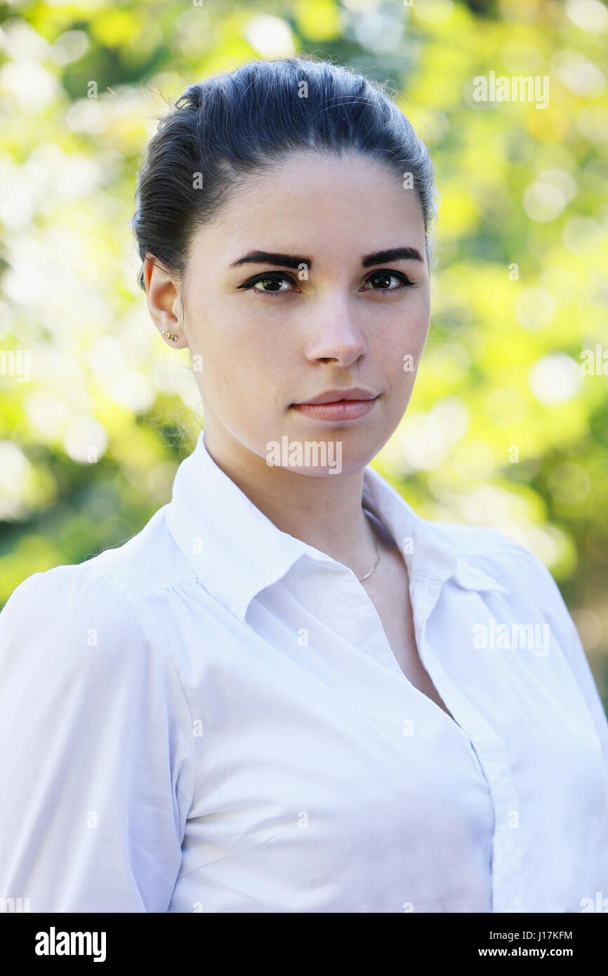 woman in a white shirt Stock Photo - Alamy