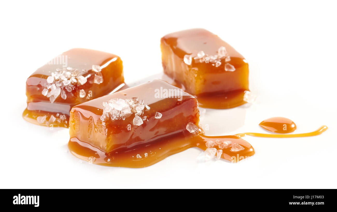 homemade salted caramel pieces isolated on white background Stock Photo ...