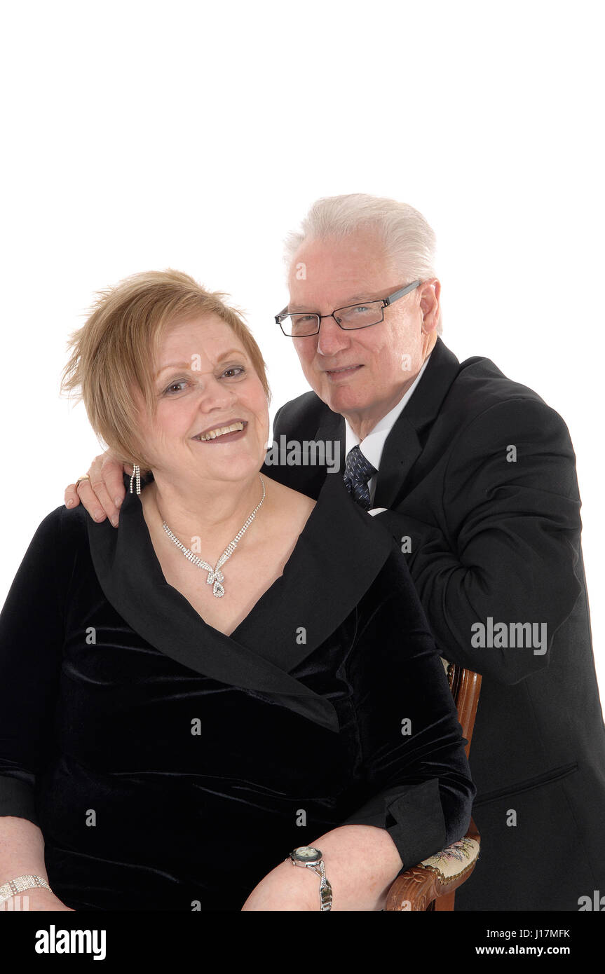 A beautiful senior citizen couple standing and embracing each other in ...