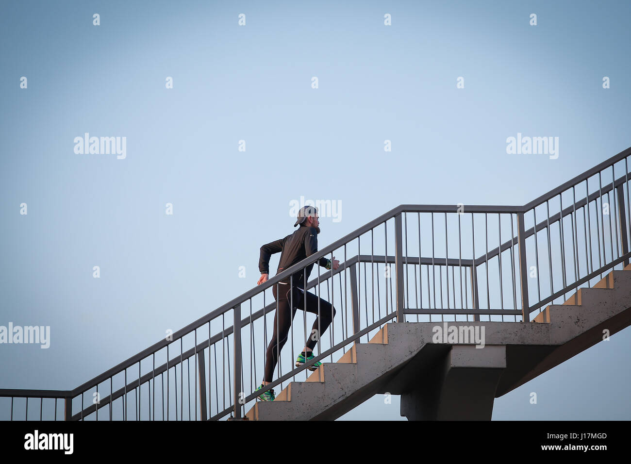 A group of people is seen taking part in a monthly organized track ...