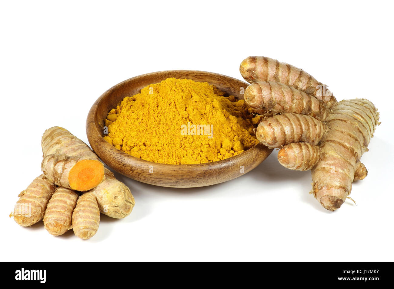 turmeric powder and rhizome isolated on white background Stock Photo ...