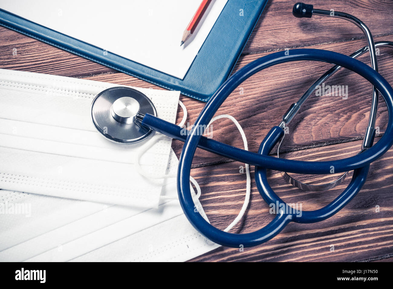 Desk of doctor with medicine things Stock Photo - Alamy