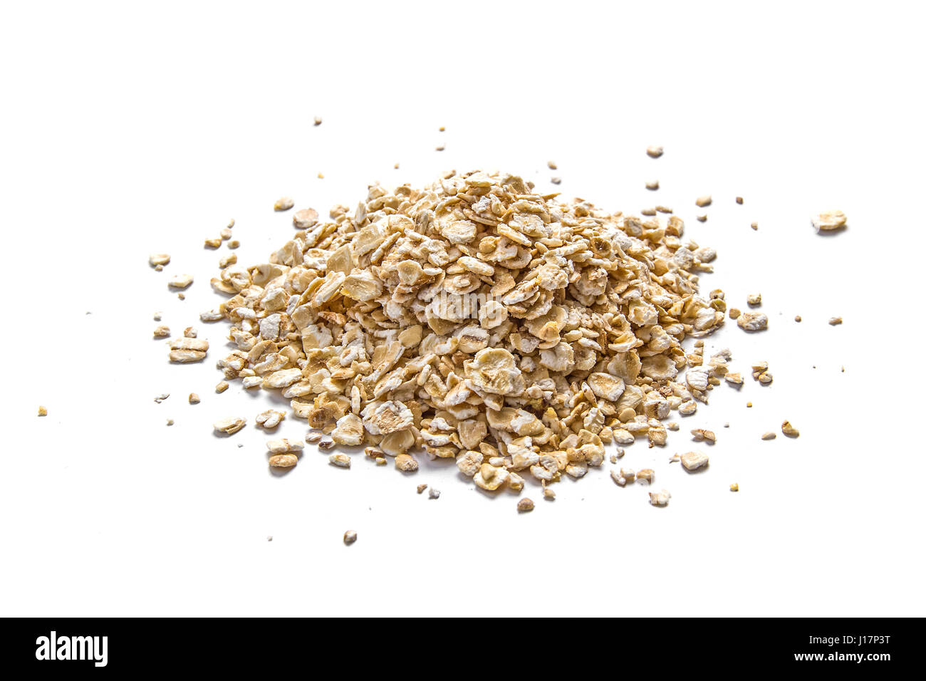 Pile of oatmeal over white background Stock Photo - Alamy