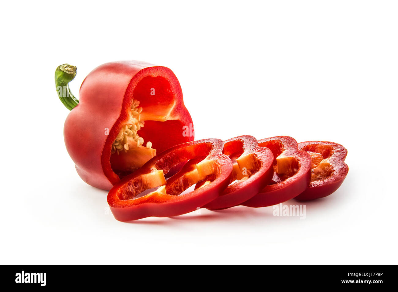Sliced pepper on white Stock Photo - Alamy