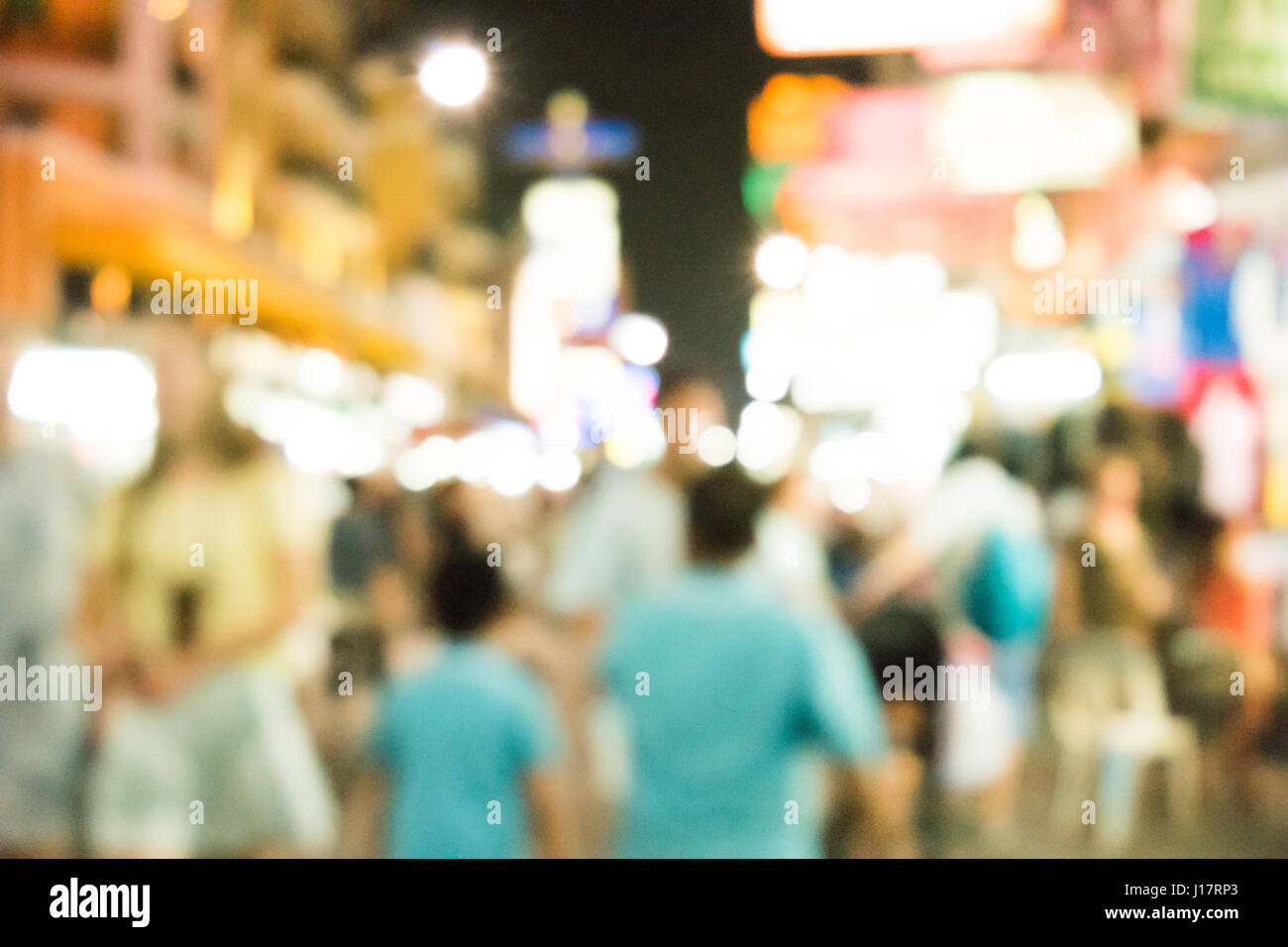 Blurred image of busy night life in the city Stock Photo - Alamy