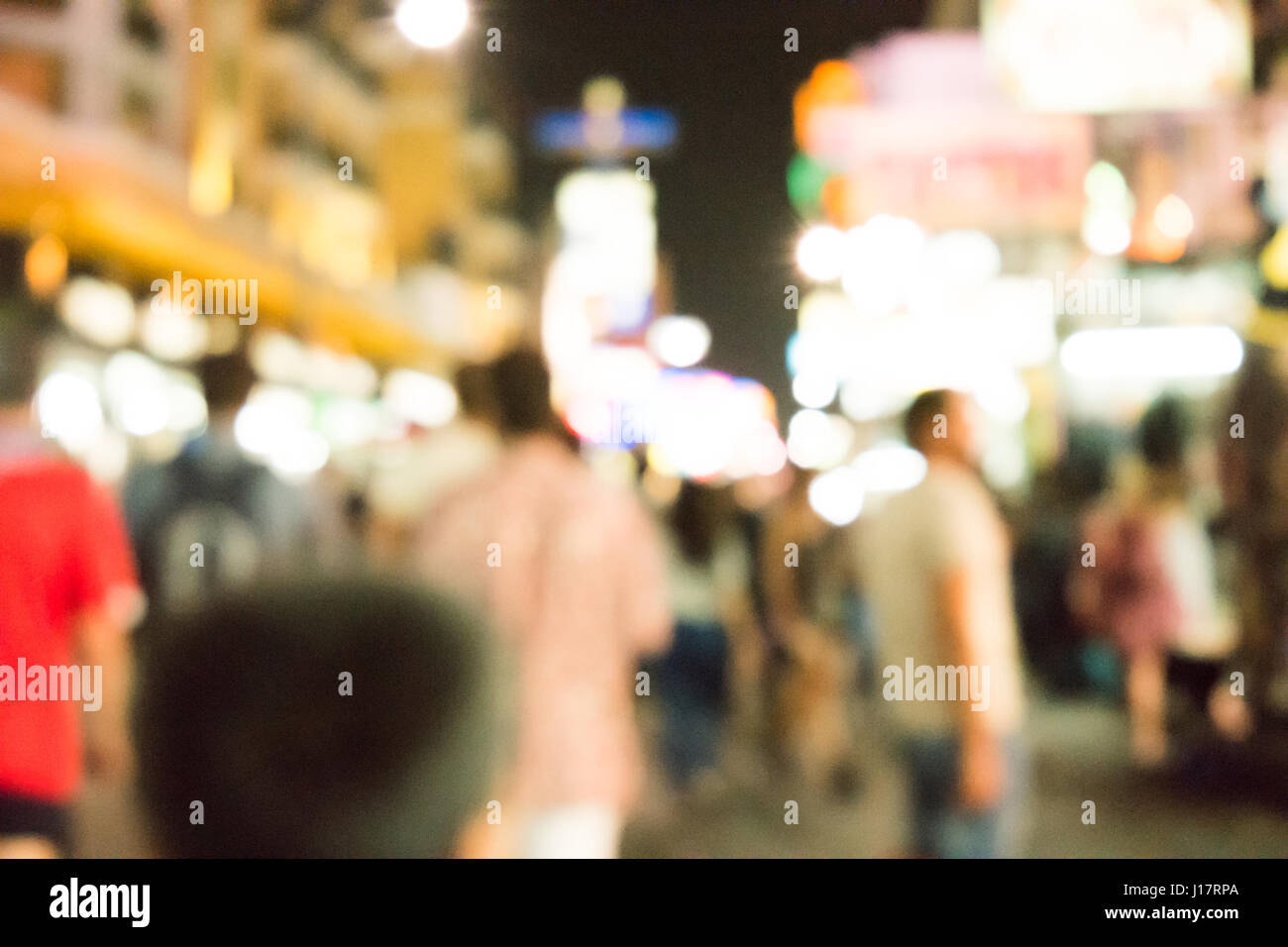 Blurred image of busy night life in the city Stock Photo - Alamy