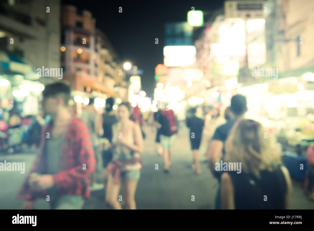 Blurred image of busy night life in the city Stock Photo - Alamy