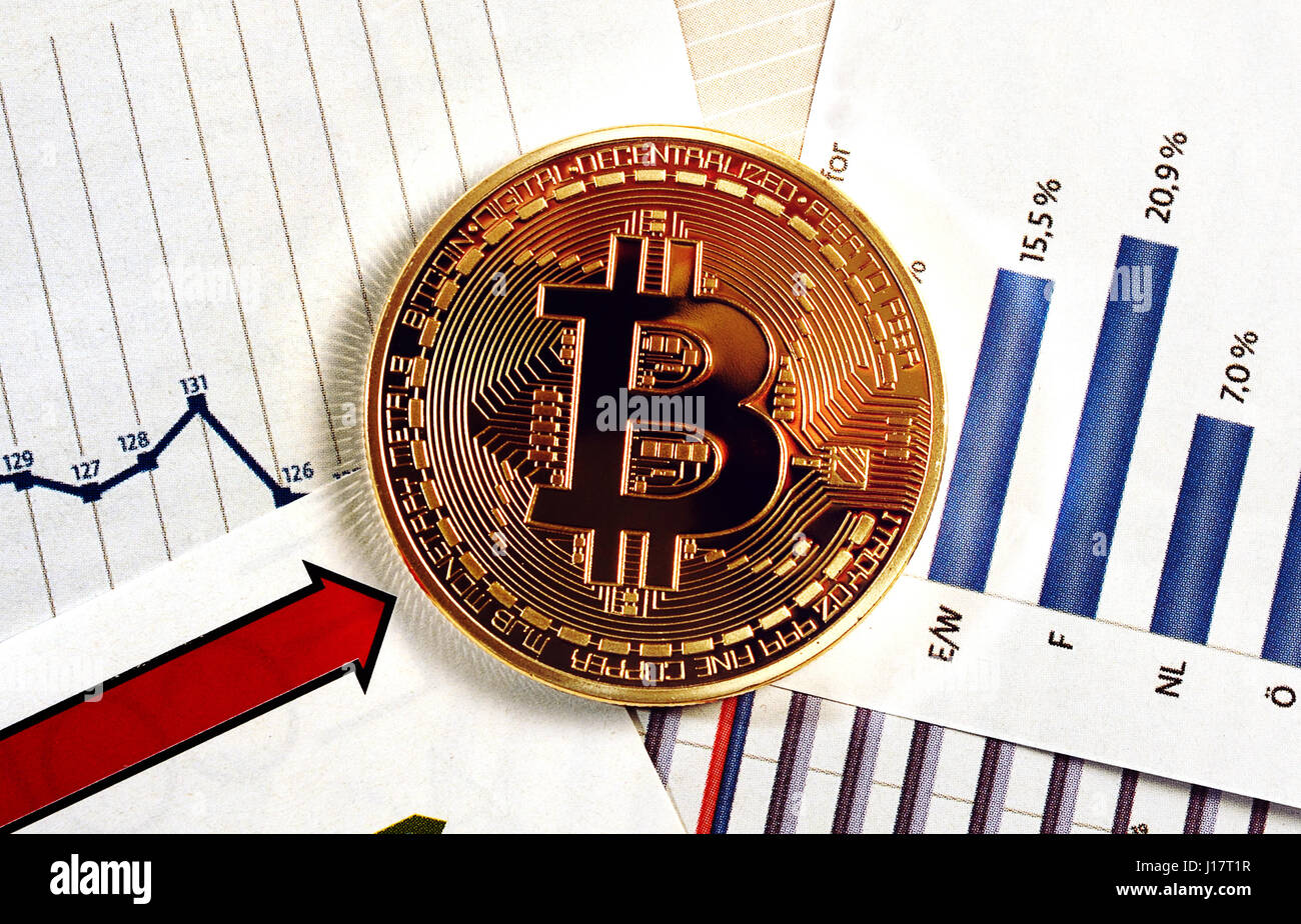 A golden bitcoin on graph and diagrams background. concept of trading ...