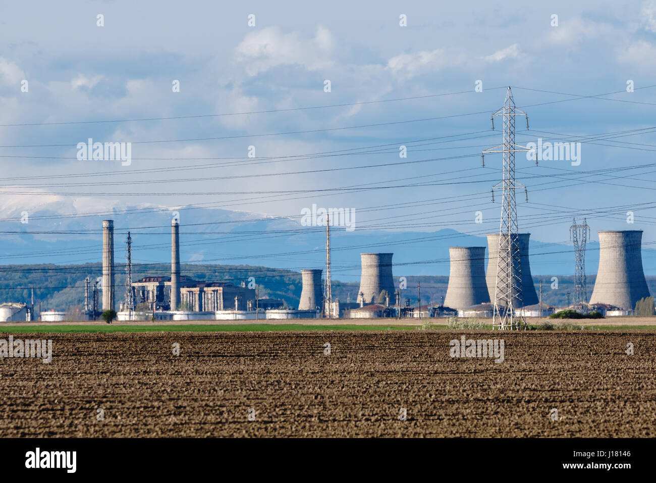 Big industrial facility seen from a distance through heat wave Stock ...