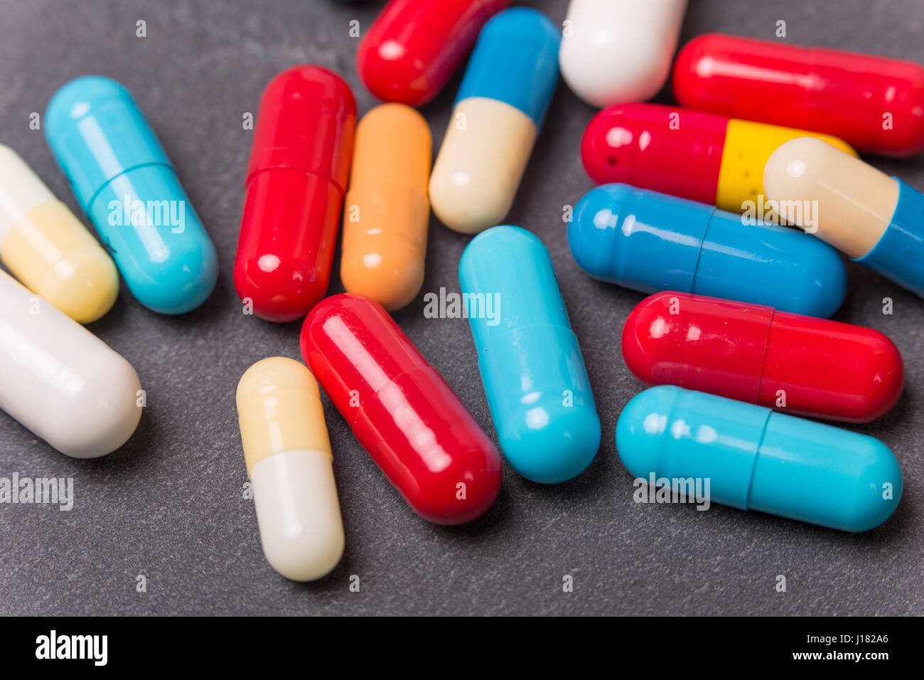 different Tablets pills capsule heap mix therapy drugs Stock Photo - Alamy