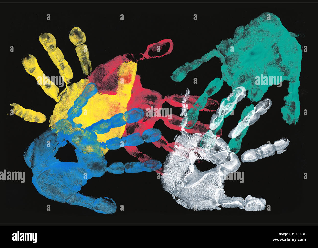 Set of colorful hand prints on black background Stock Photo - Alamy