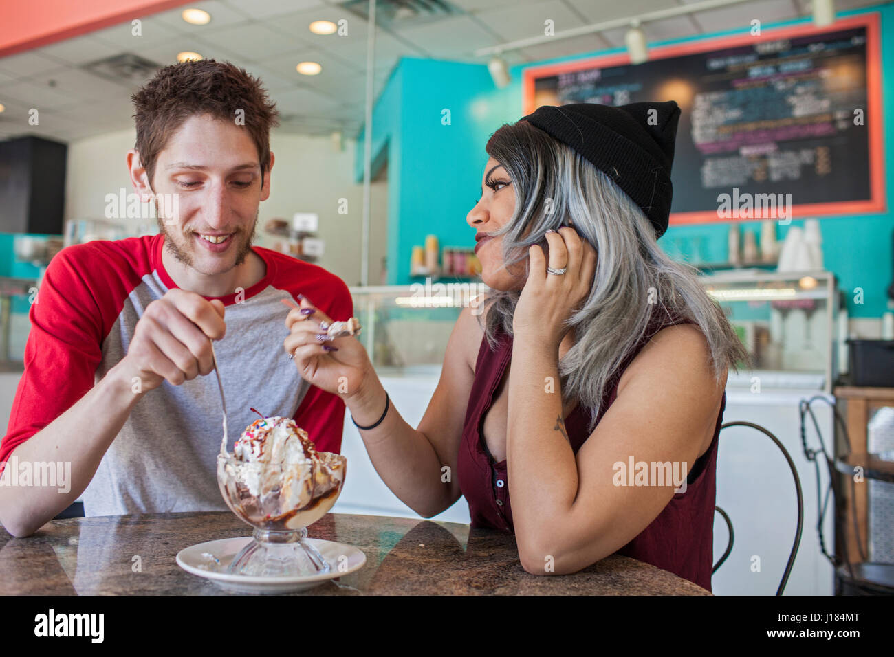 Young couple at an ice cream shop Stock Photo - Alamy