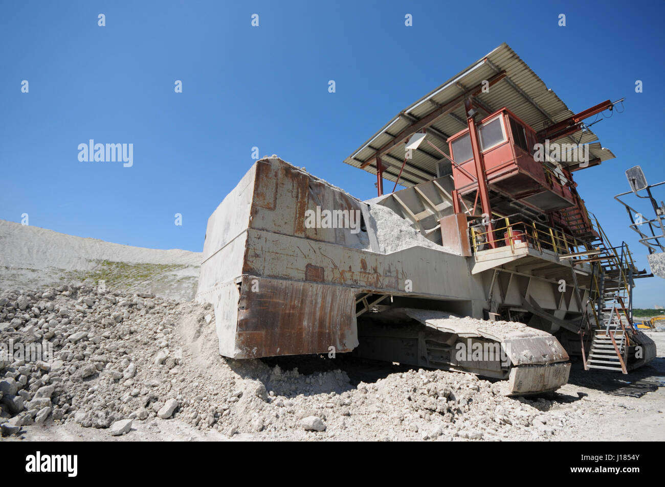 stone crusher machine in an open pit mine. mining industry. chalk ...