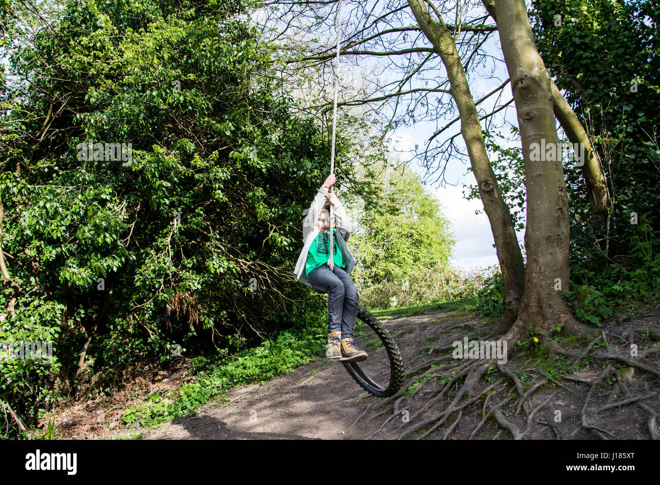 On childrens swing hi-res stock photography and images - Alamy