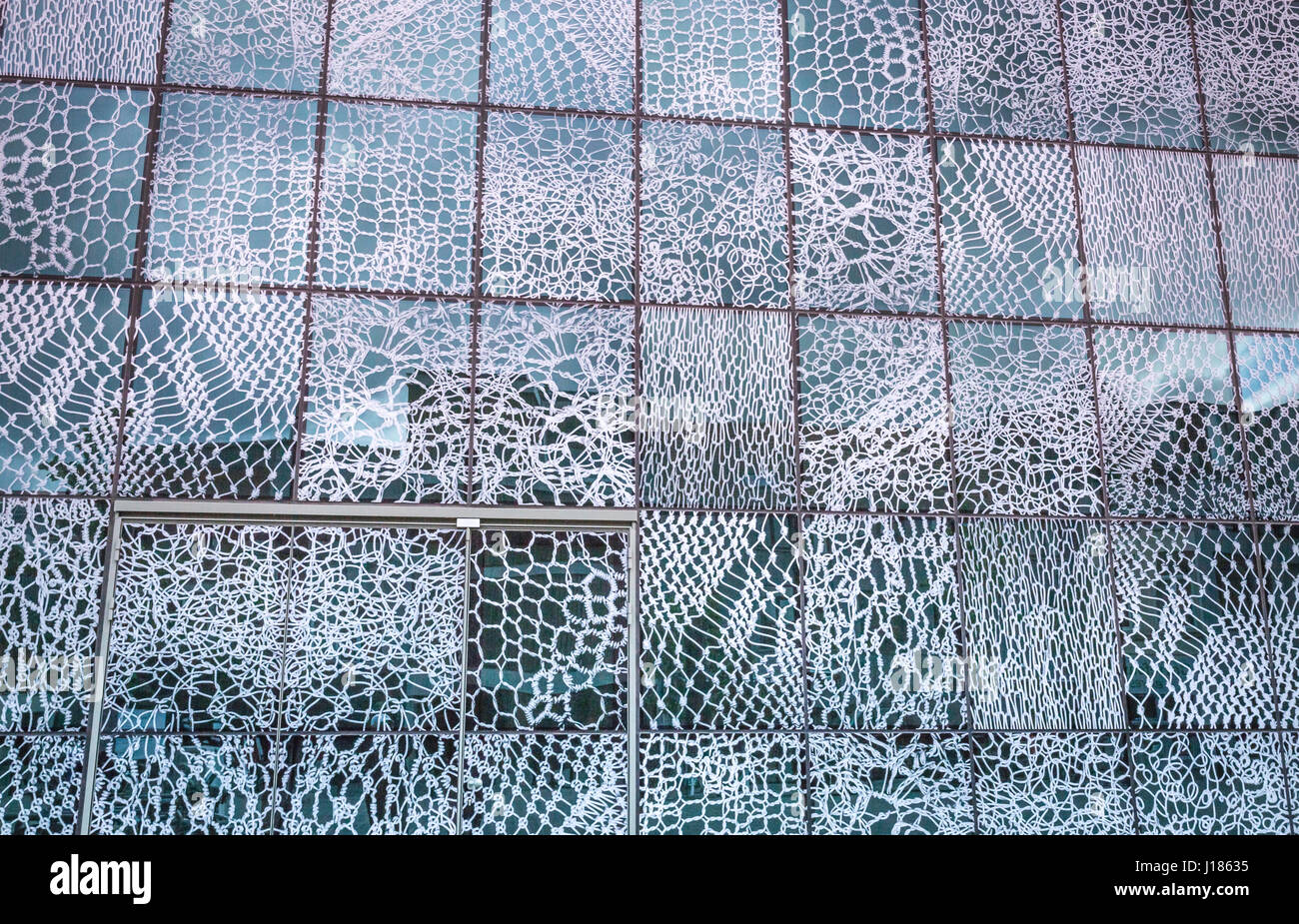 Beautiful glass wall with decorative rope art in Ghent Belgium Stock ...