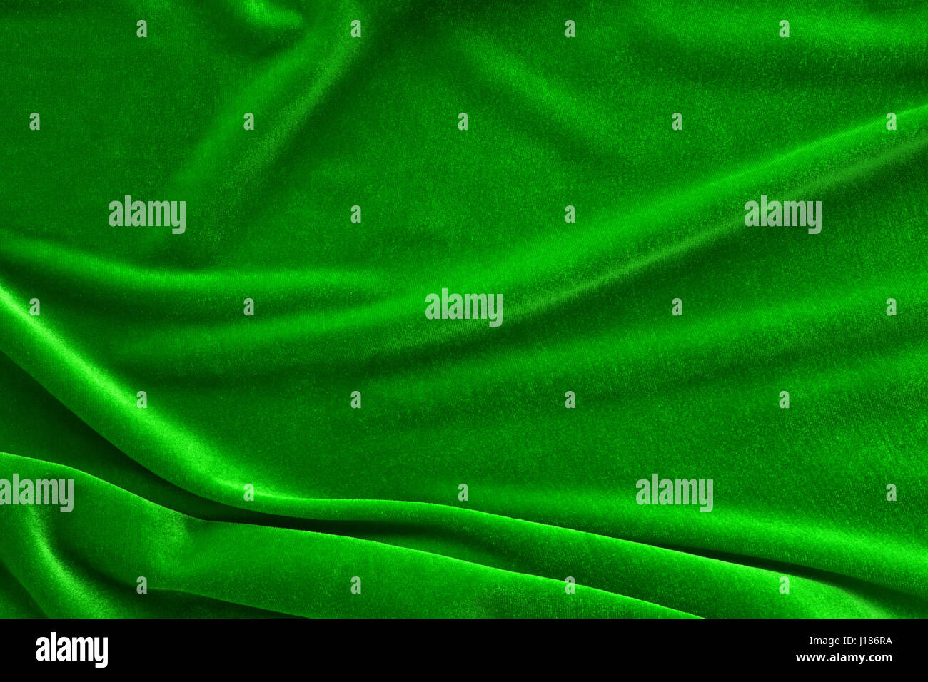 Green silk velvet cloth texture and background Stock Photo - Alamy