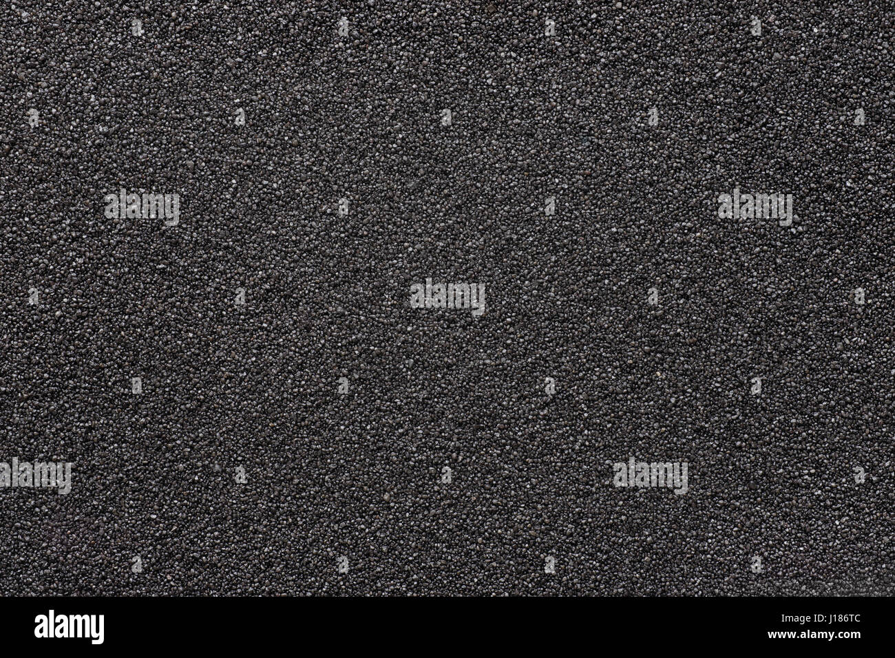 Black sand. Texture and background Stock Photo - Alamy
