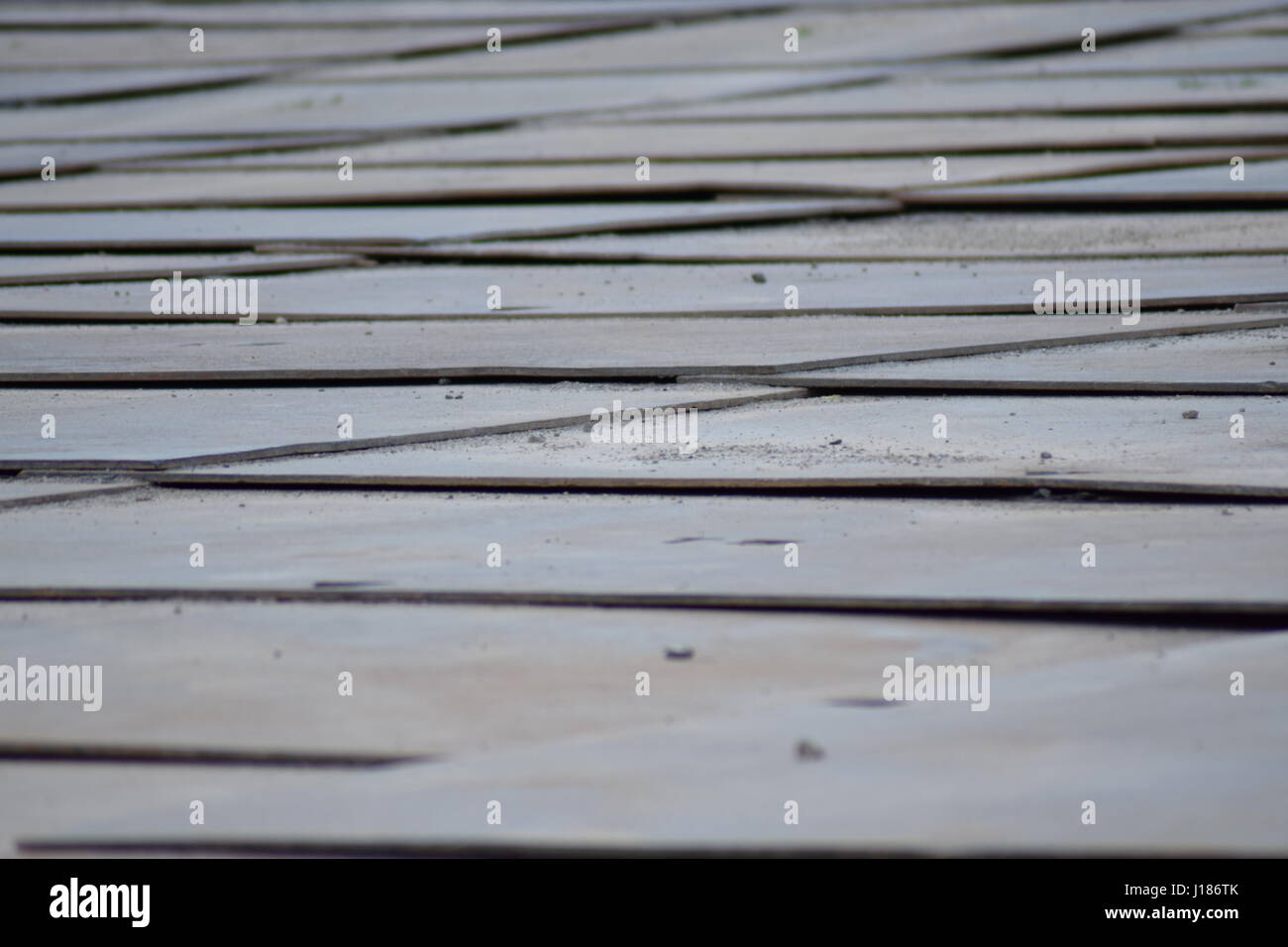 Metal plates laid out on the ground for construction work Stock Photo ...