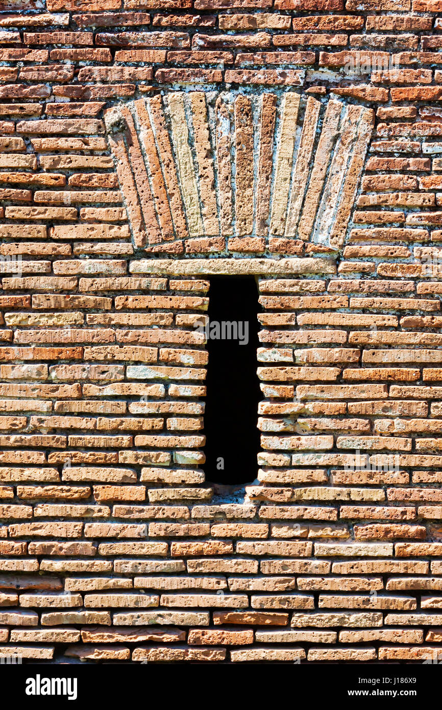 Roman brick wall with louver in Ostia Antica - Rome , Italy Stock Photo ...