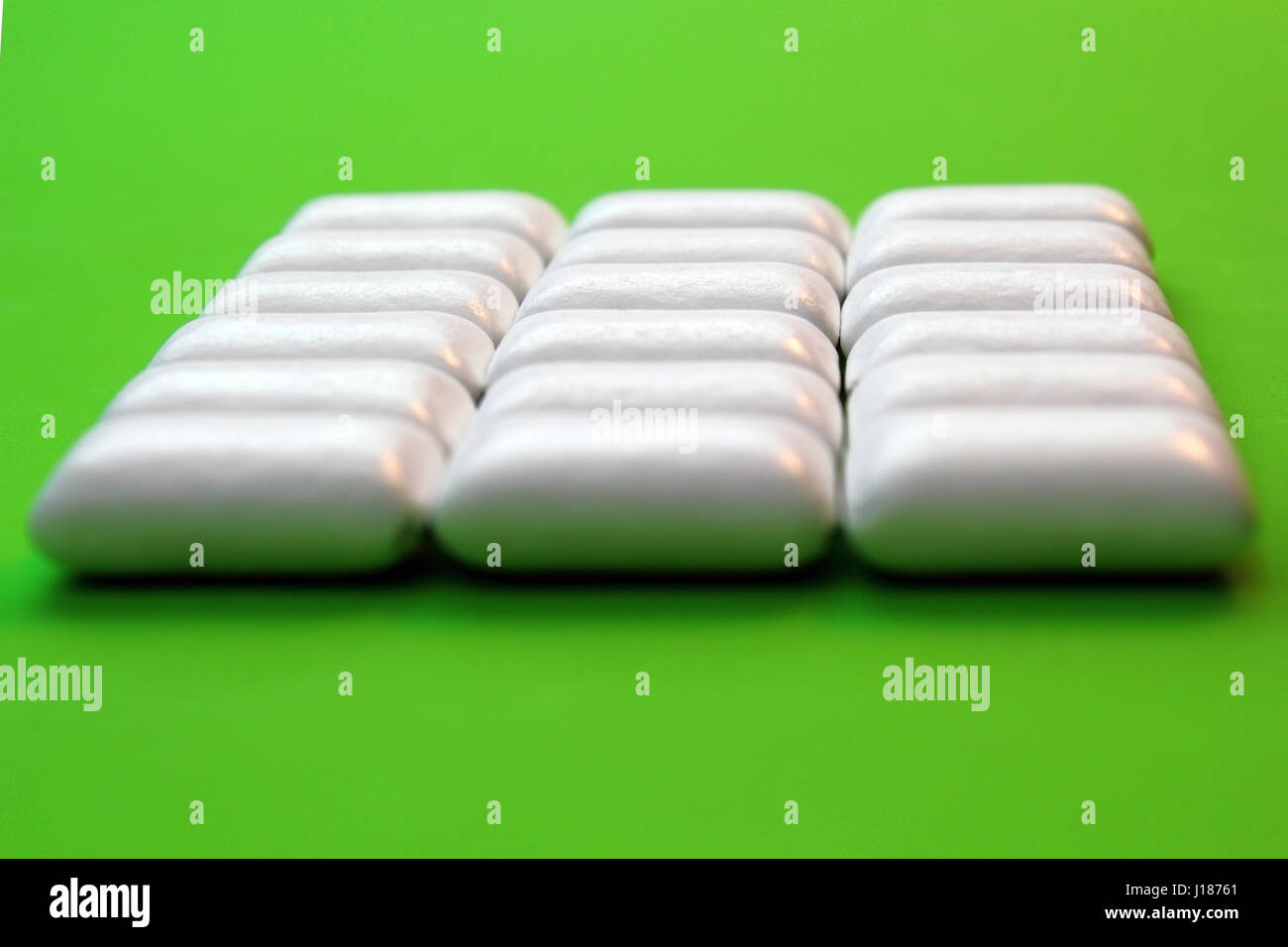 Chewing gum aligned Stock Photo - Alamy