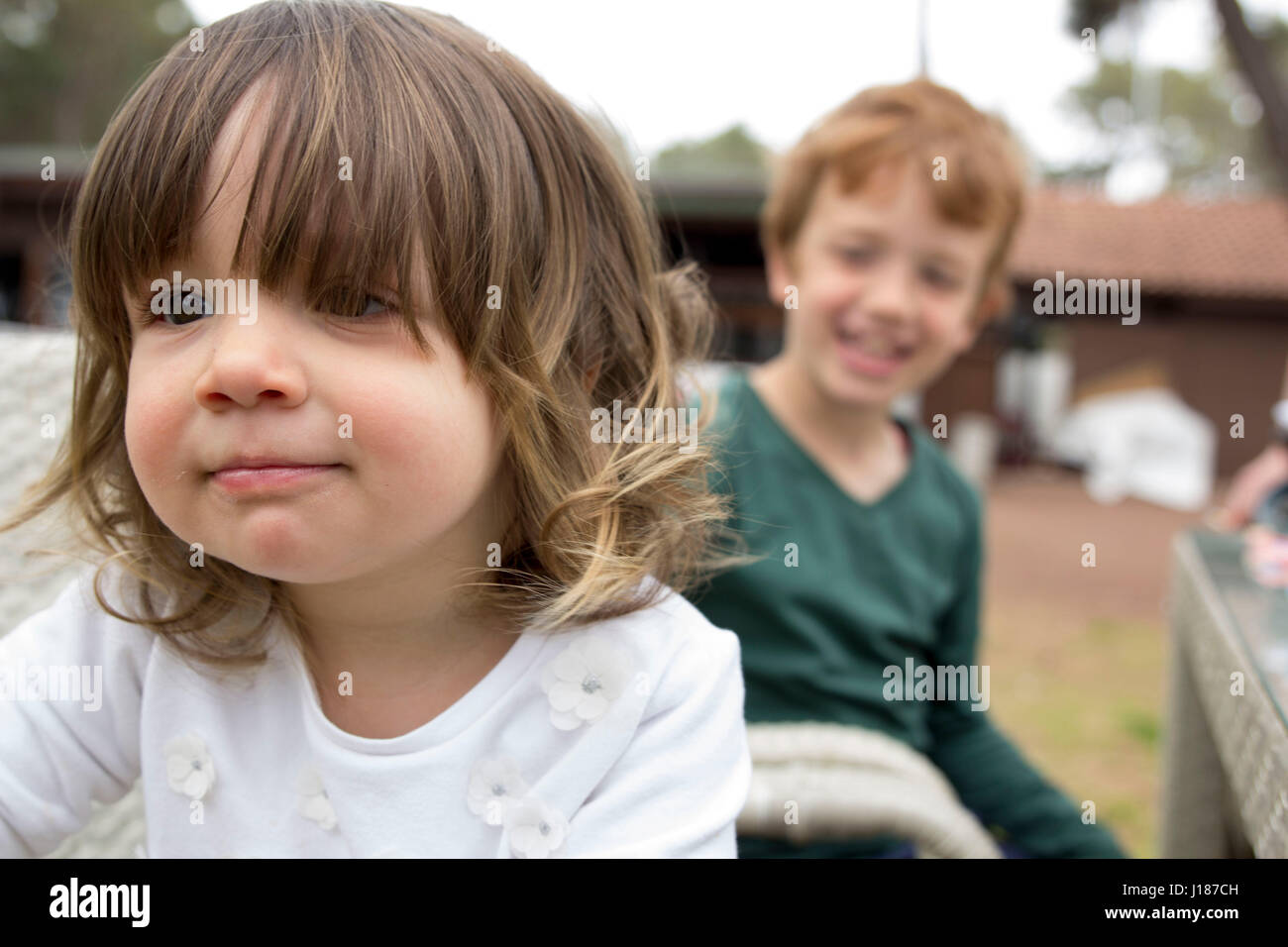 Happy brother sister in park hi-res stock photography and images - Alamy