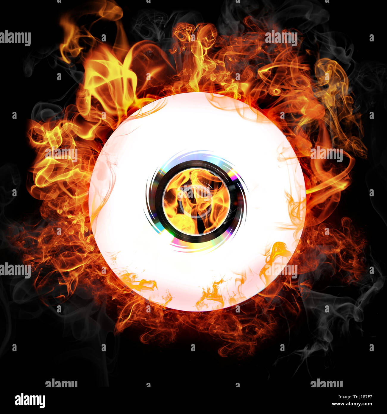 Cd wrapped in flames illustrating the process of writing a cd Stock ...