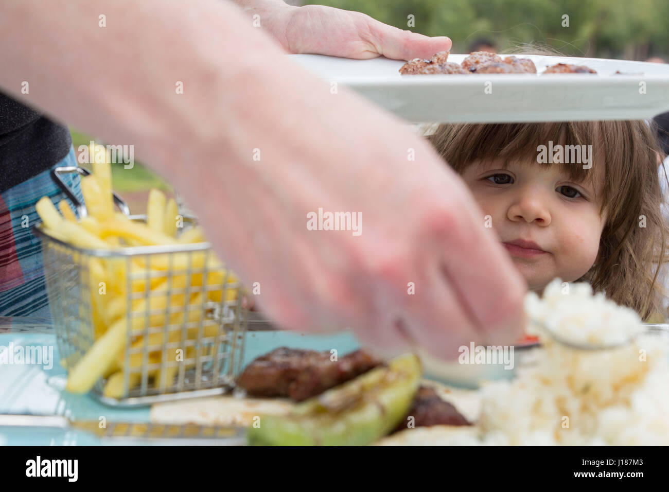 baby at dinner table Stock Photo - Alamy